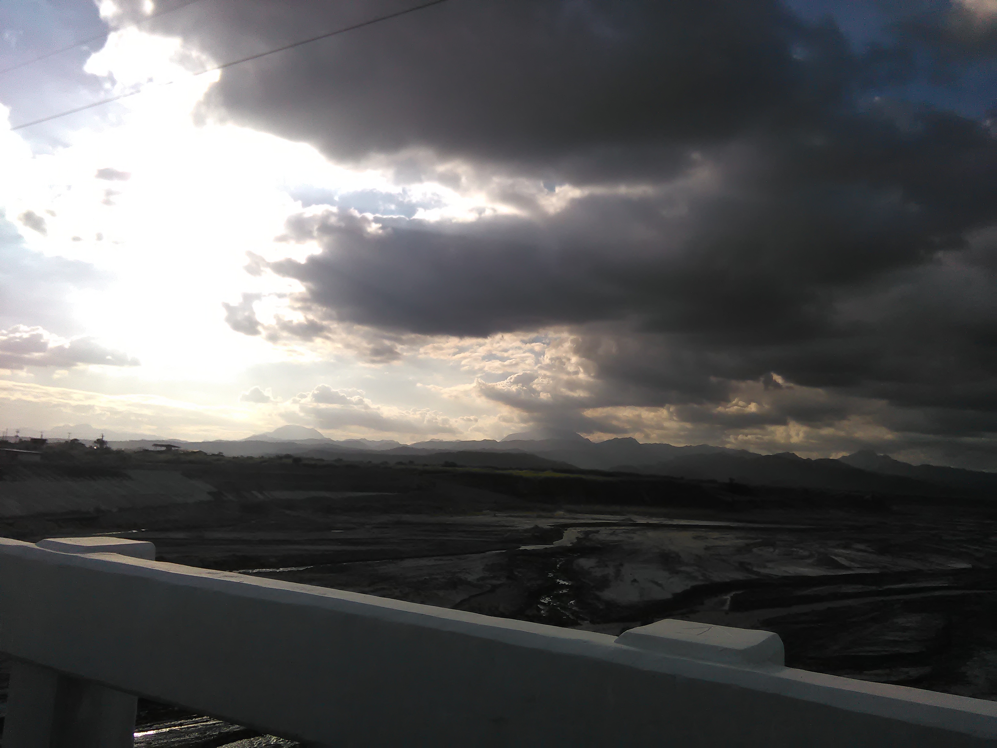 Lahar viewed from Porac bridge by Resty Carlos – Eagle News